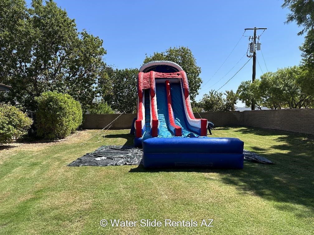 Large dual lane water slide with 2 slides and slip n slide, large pool