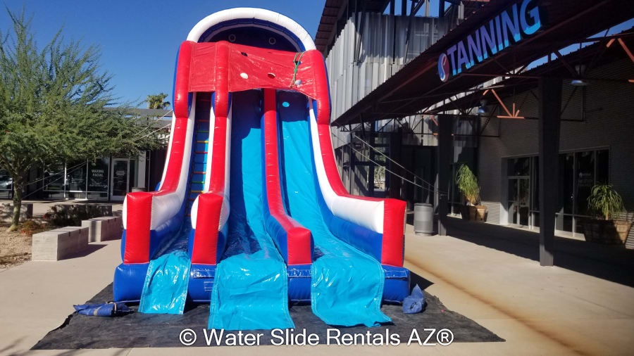 Large dual lane water slide with 2 slides and slip n slide, large pool
